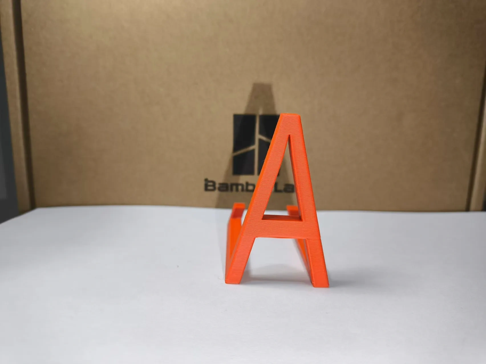 A Letter Phone Stand (Only 4.5g) by 生气的小鸡 - MakerWorld