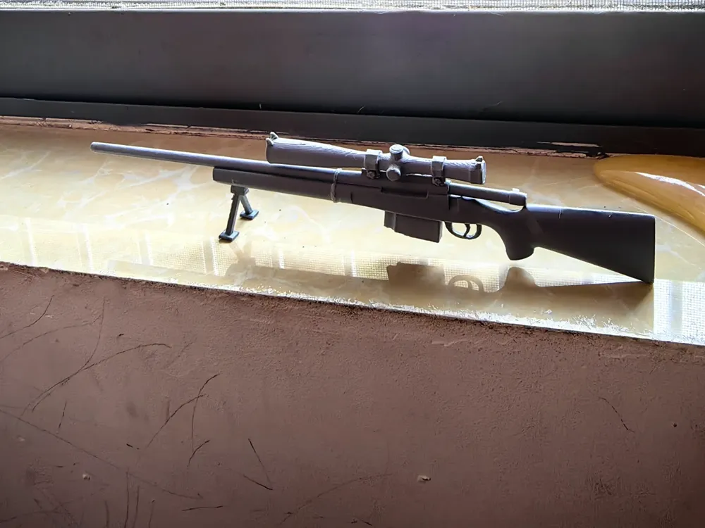 M24 Sniper Rifle, with a pull-back bolt, detachable magazine, and scope ...