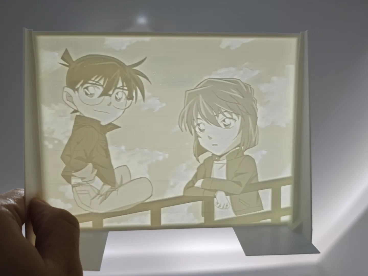 A monochrome lithophane photo of Ai Haibara and Conan by user ...