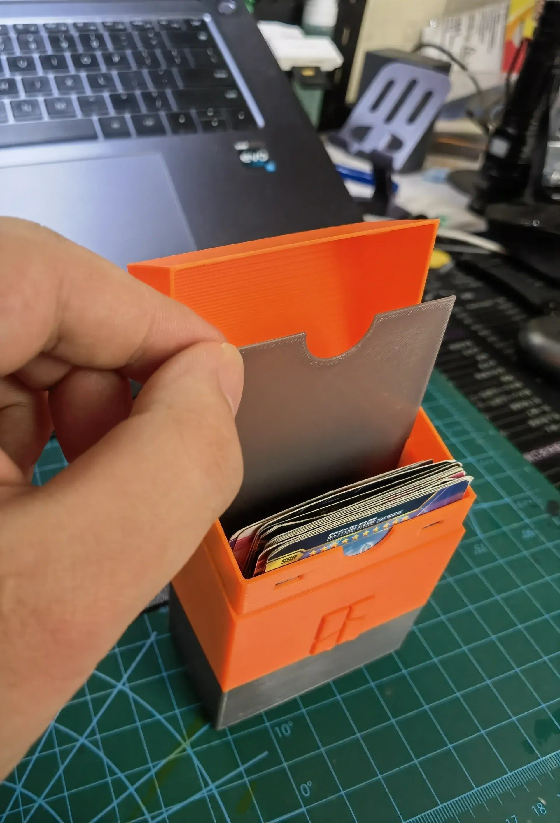 A portable card case for holding playing cards, game cards, IDs, or ...