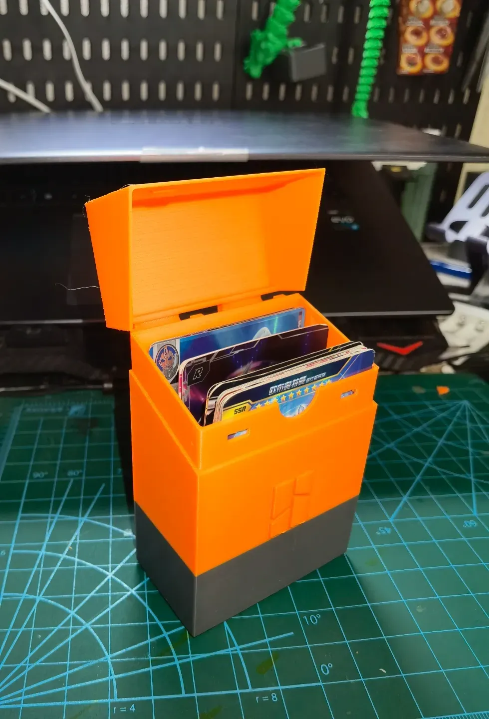 A portable card case for holding playing cards, game cards, IDs, or ...