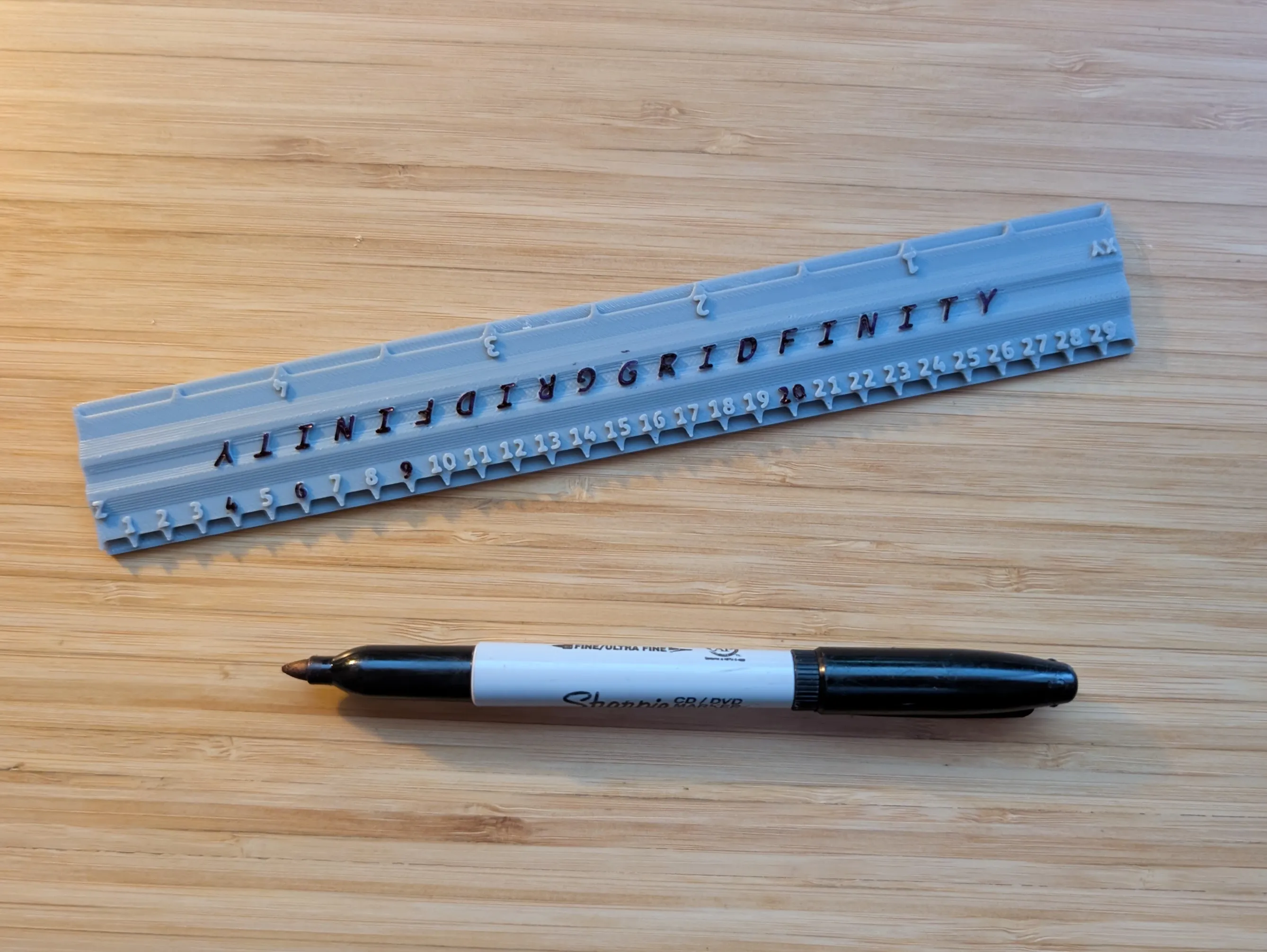 Gridfinity Ruler [7 Unit Length, Embossed Version] - Free 3D Print Model - MakerWorld