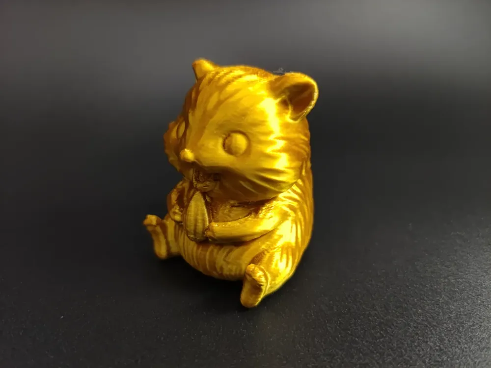 Adorable hamster eating seeds by hild - MakerWorld