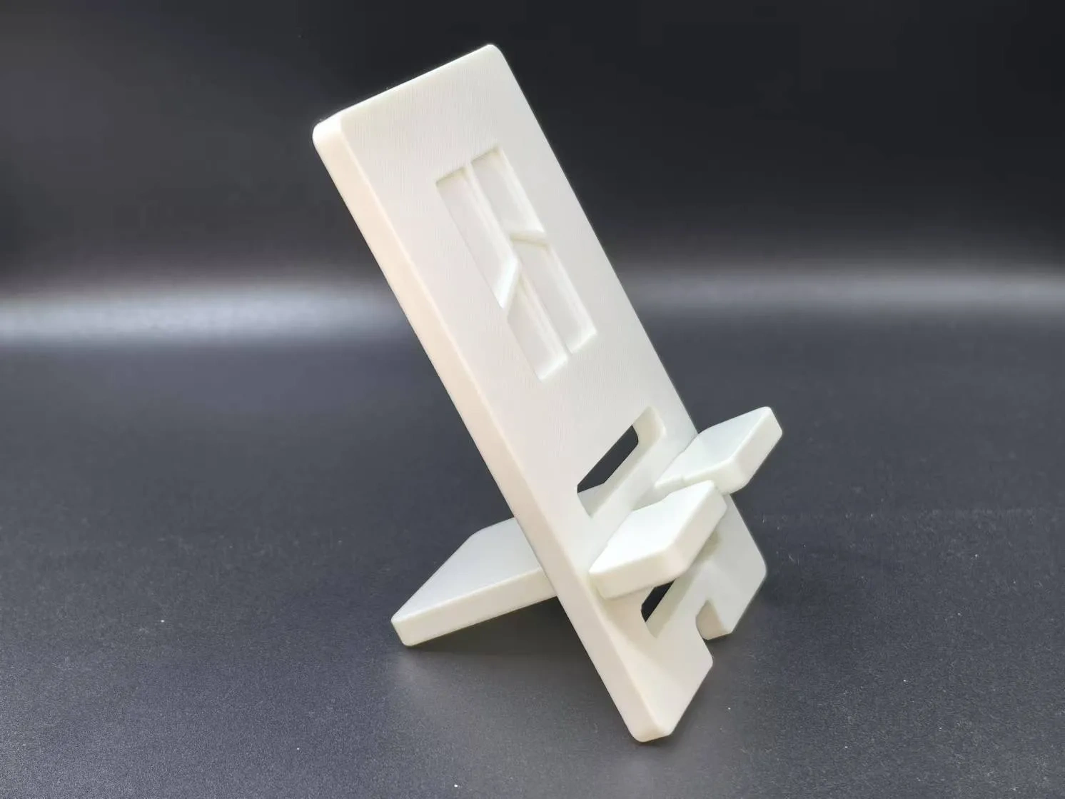 Creative Phone Stand by user_1895568282 - MakerWorld