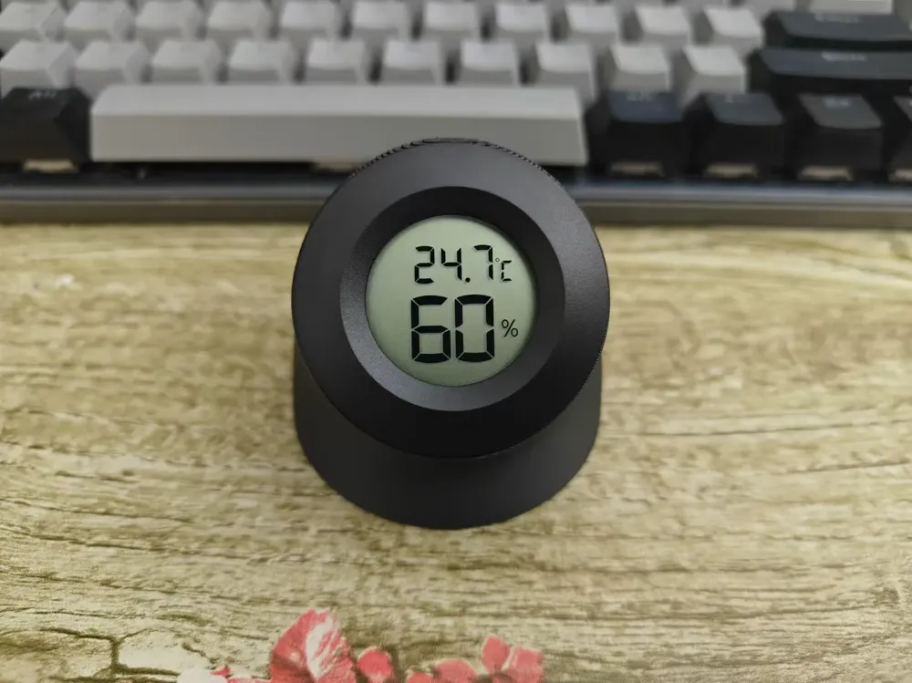 A sleek and aesthetically pleasing enclosure for a desktop hygrometer ...