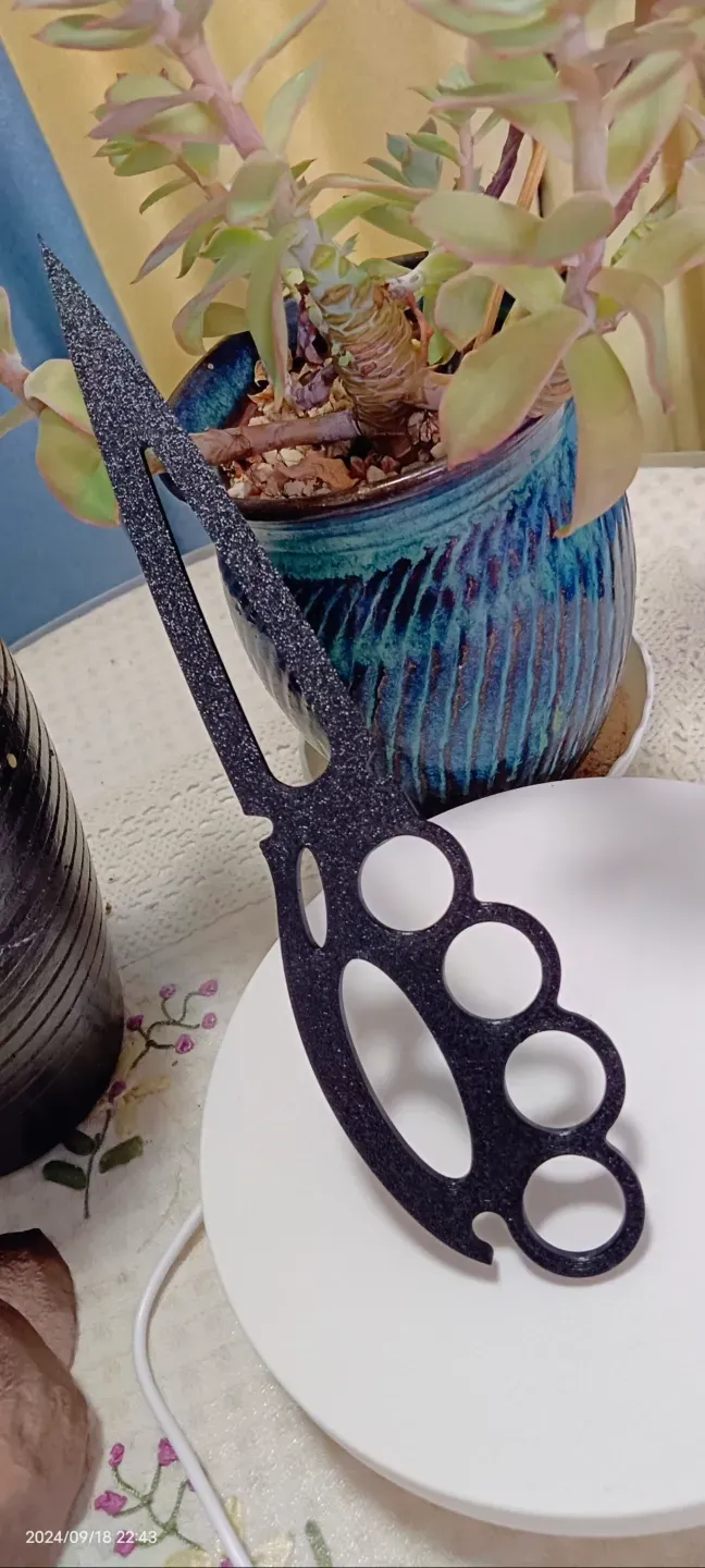 Openwork Brass Knuckles Knife by HANMAO MakerWorld: Download Free 3D Models