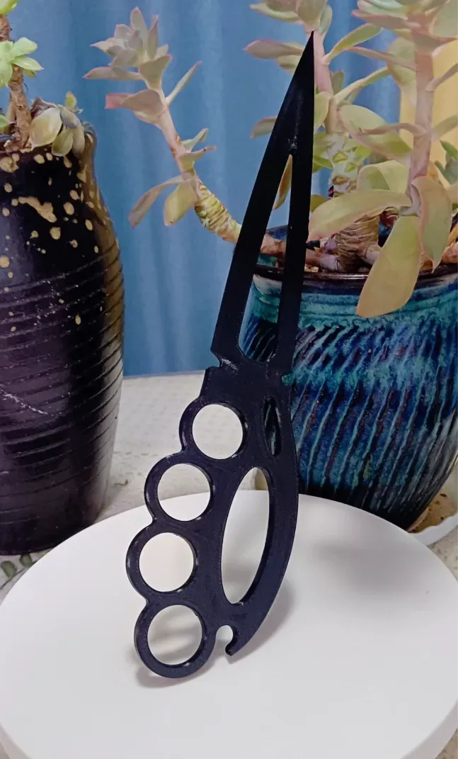 Openwork Brass Knuckles Knife by HANMAO MakerWorld: Download Free 3D Models