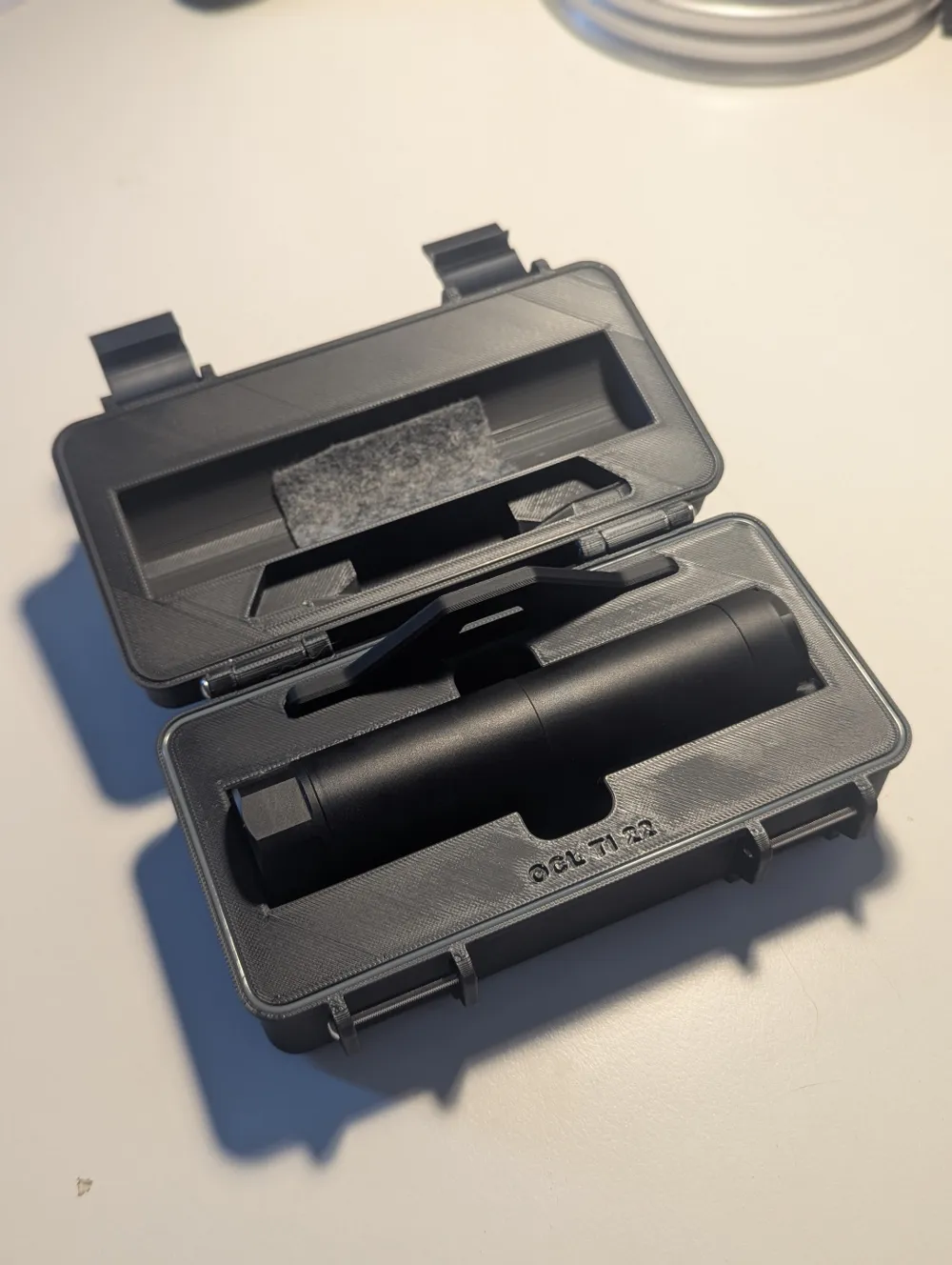 OCL Titanium 22 Supressor Case Remixed by tyleranastasi - MakerWorld