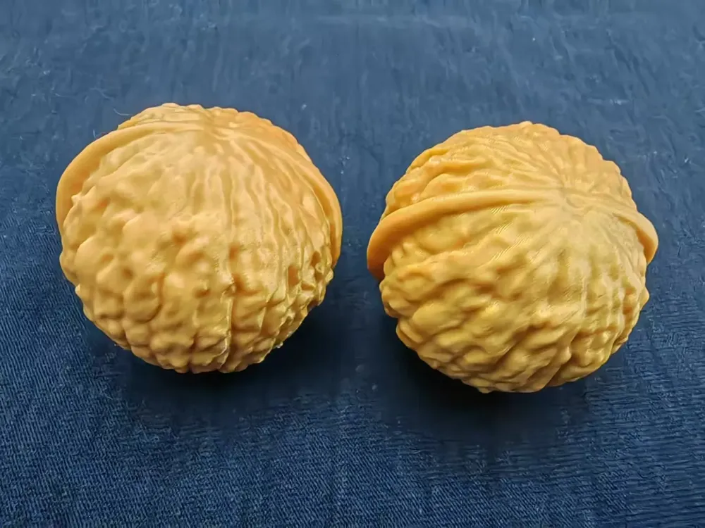 A pair of golden walnuts, ready for playing! by majiweida - MakerWorld