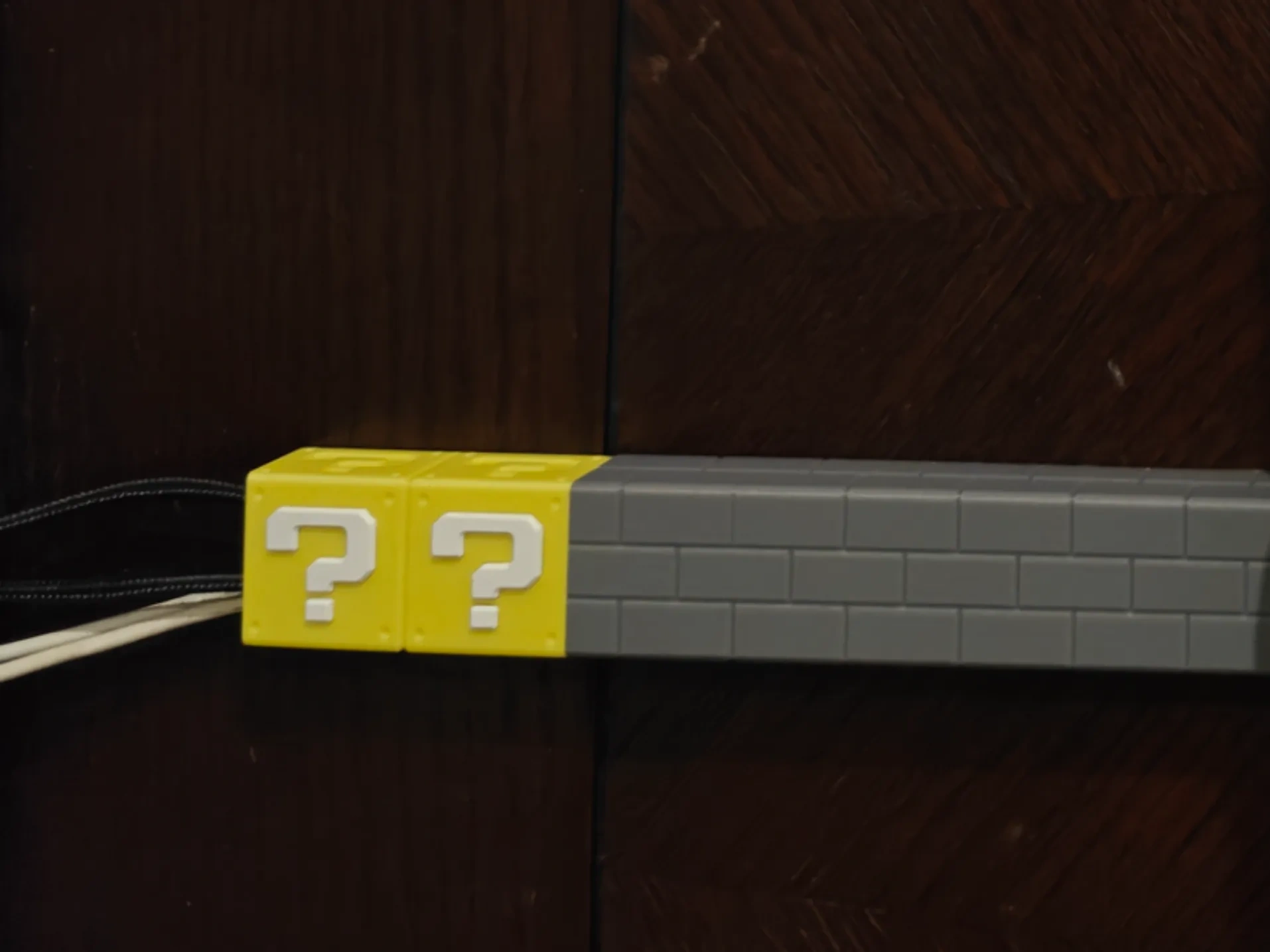 Mario-themed wall tile cable channel by llfsclf - MakerWorld