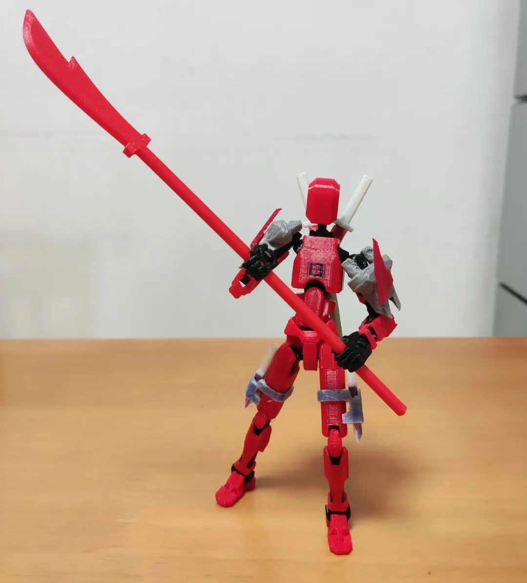 Segmented human figure and a crescent blade used by No. 13 by anson ...