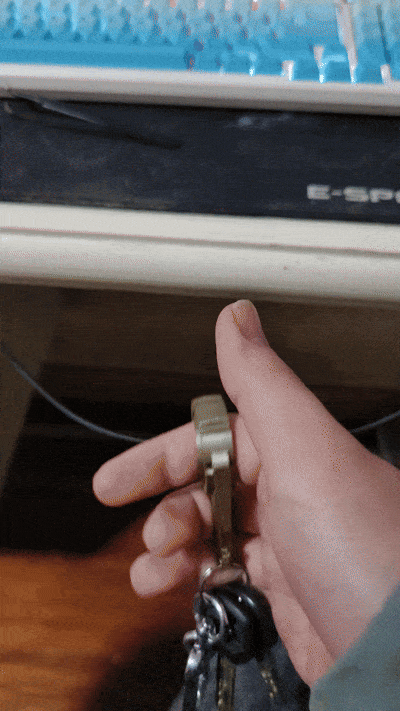 A keychain that lets your keys spin like a fidget spinner (with a ...
