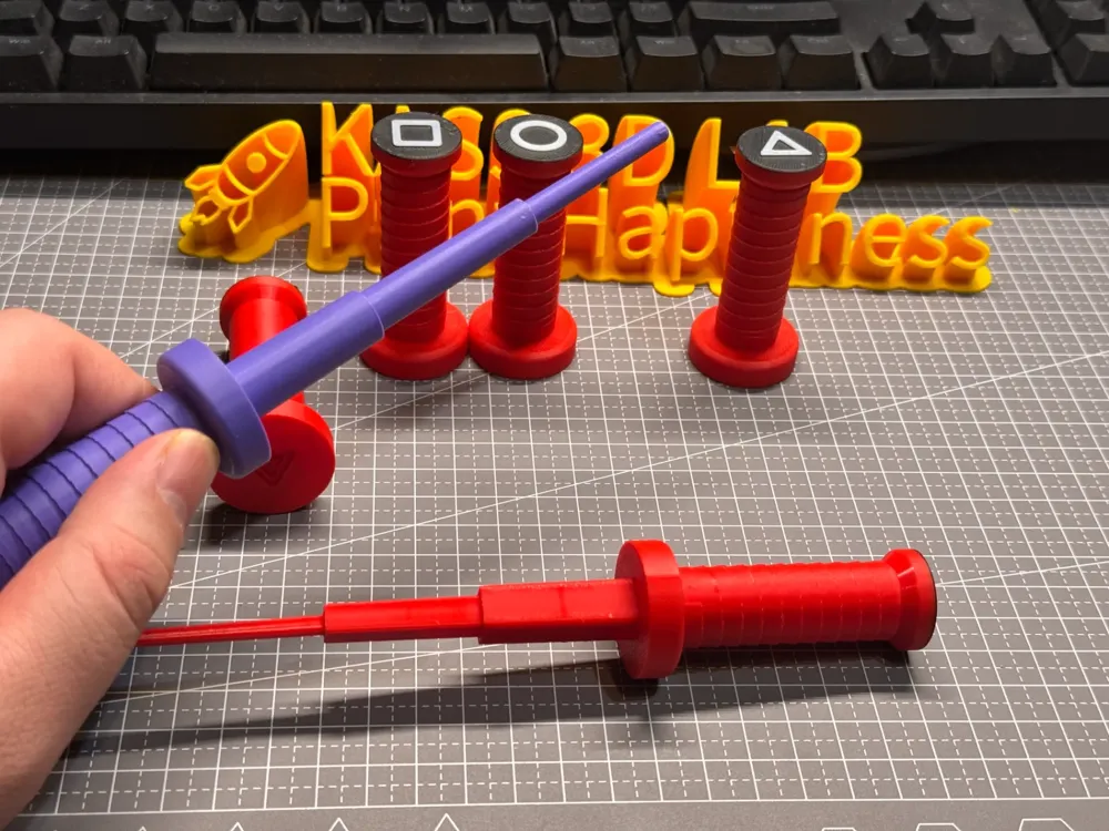 Squid Game style mini retractable sword by Kass 3D MakerWorld: Download ...