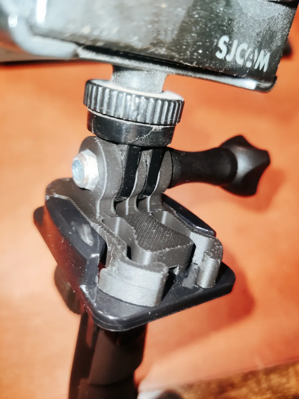 SJ4000 action camera mount by Antonello De Angelis MakerWorld: Download Free 3D Models