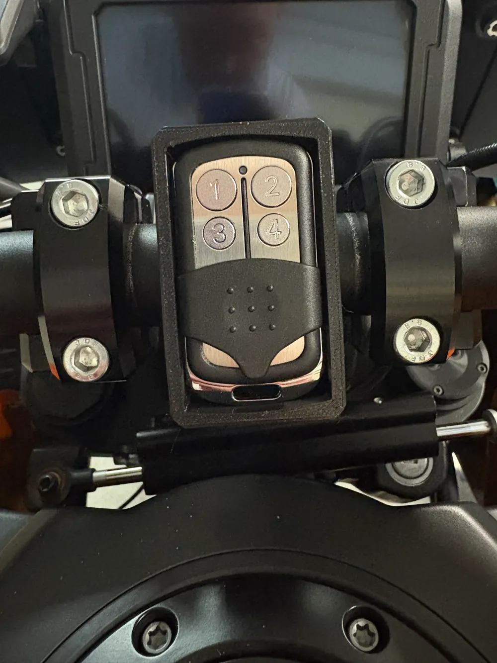 Motorcycle handlebar garage door remote holder by SprockJohnson ...