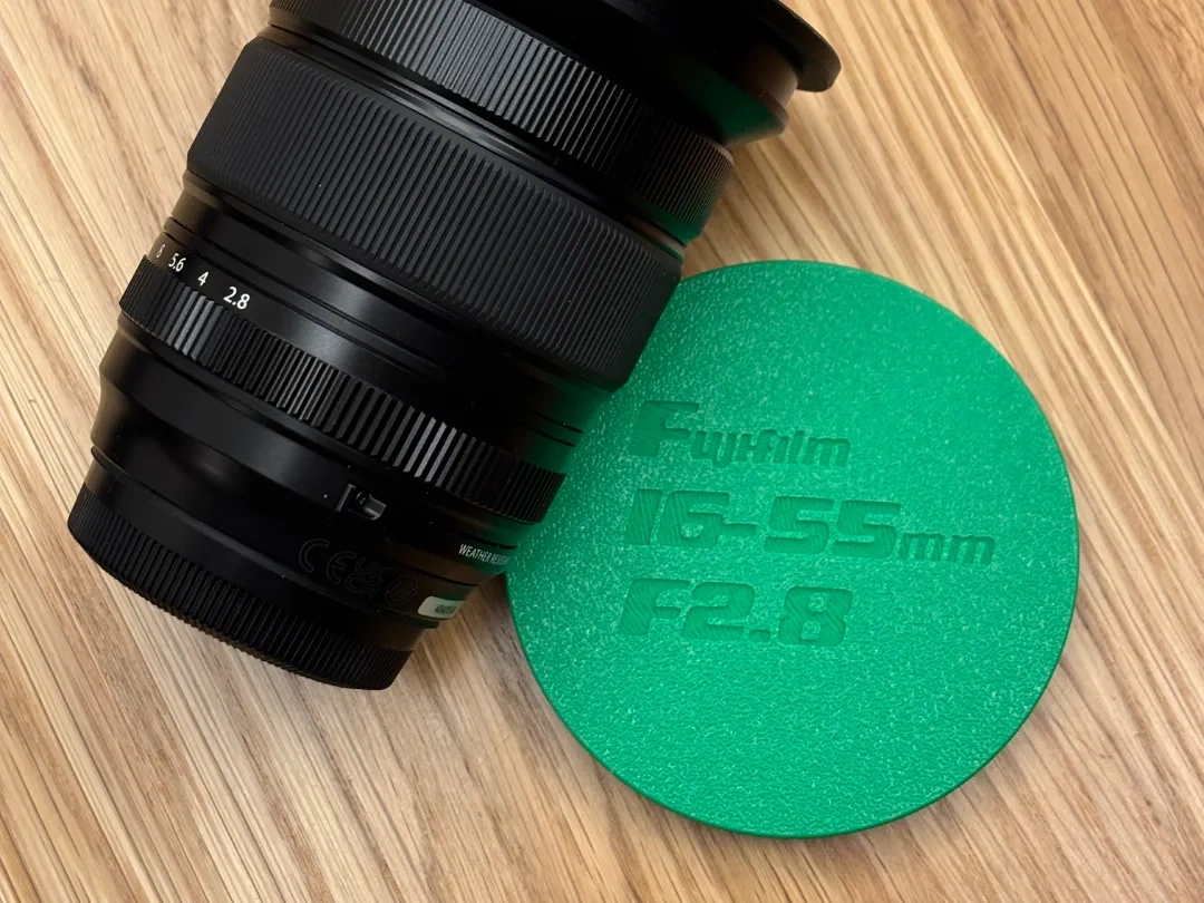 82mm filter adapter ring, lens cap, engraved with "Fujinon 16-55mm f2.8 ...