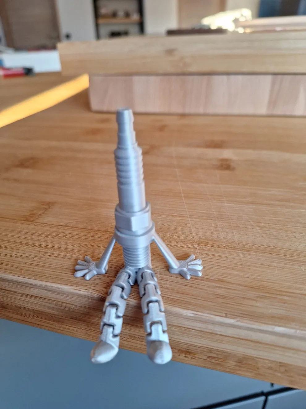 Articulated flexi sparkplug with legs by Mick23 MakerWorld: Download Free 3D Models