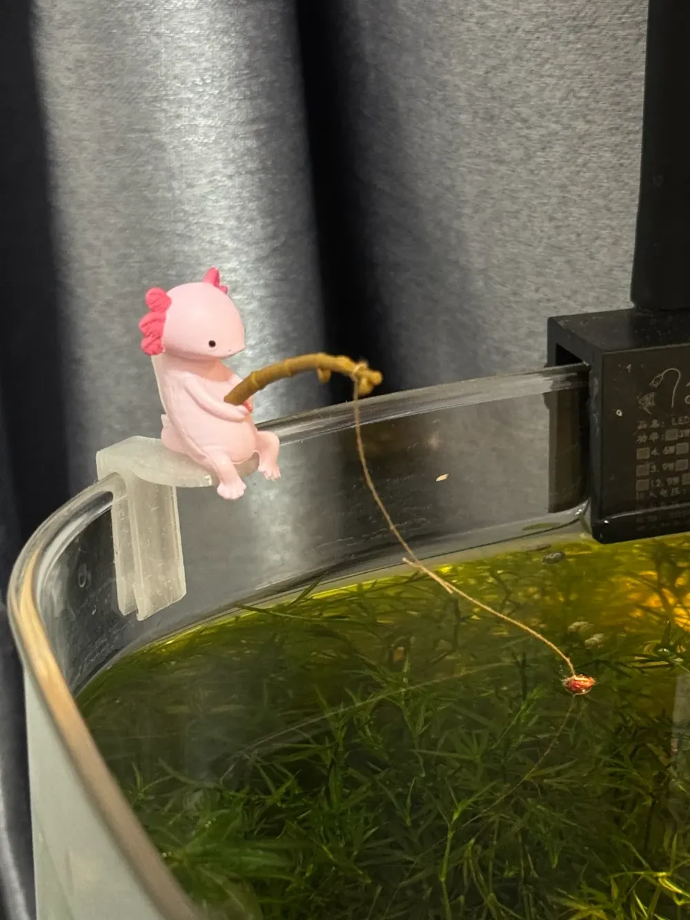 Fish tank side fishing platform, for placing fishing toys by Lucien Liu ...
