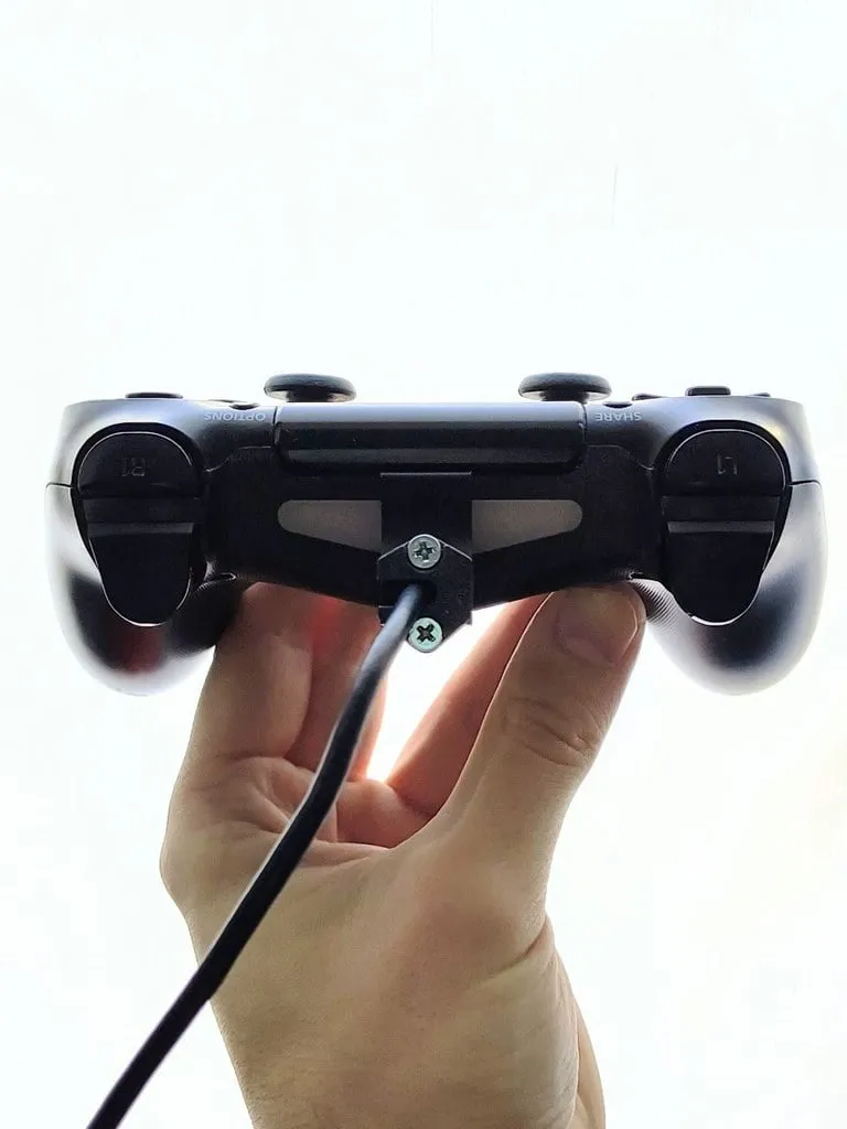 PlayStation DualShock 4 Cable Guard Remixed by dalbyte - MakerWorld