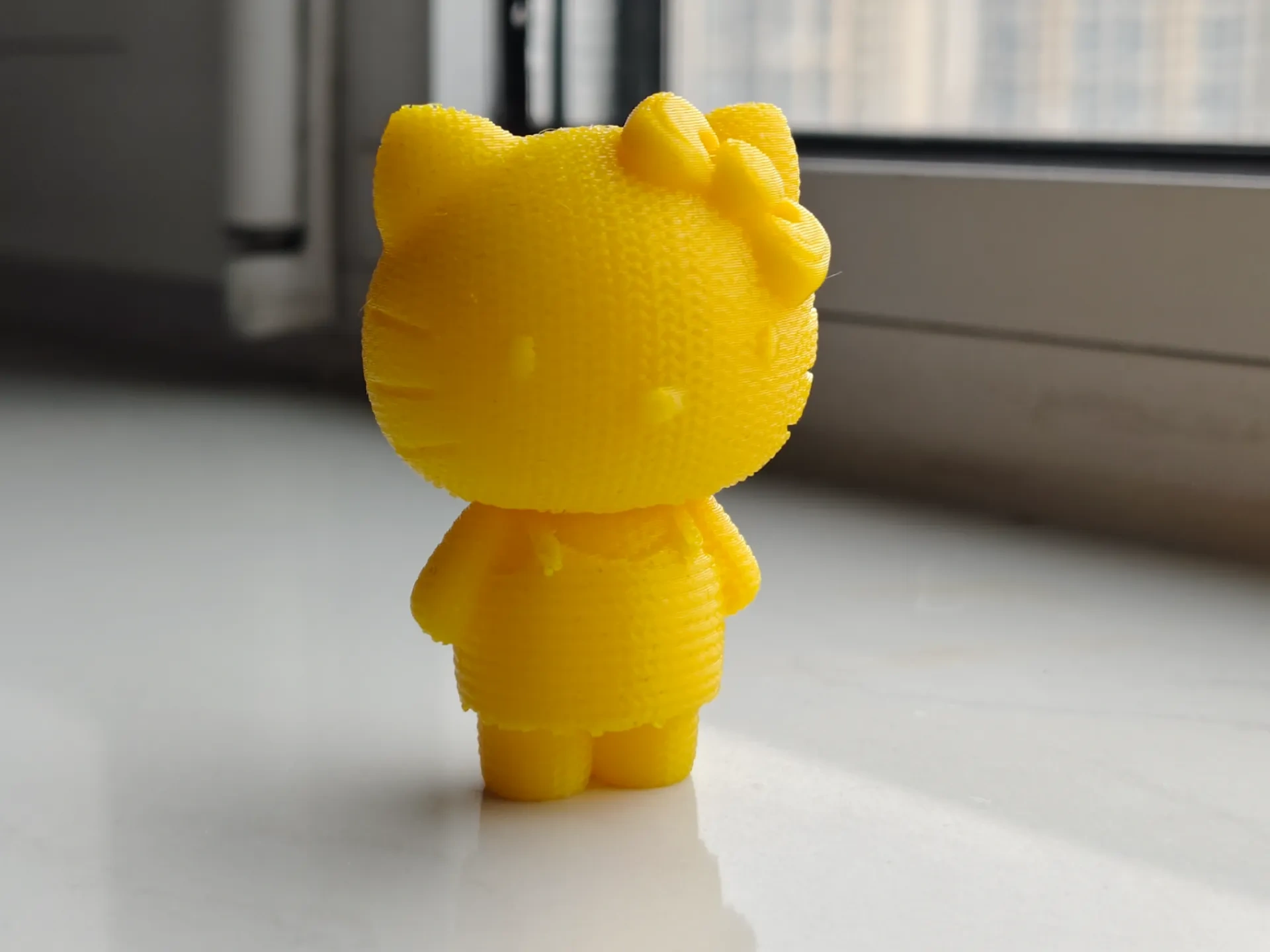 Knitted Hello Kitty cat in overalls by user_1841916337 - MakerWorld