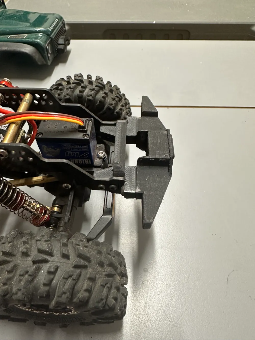 Traxxas TRX4M front bumper (with body lift) by Making Addicted - MakerWorld