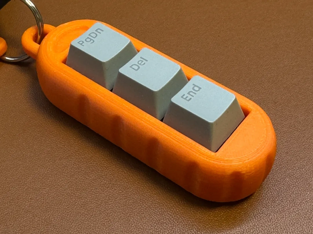 Smooth fidget keyboard keychain by user_1987514536 MakerWorld: Download ...