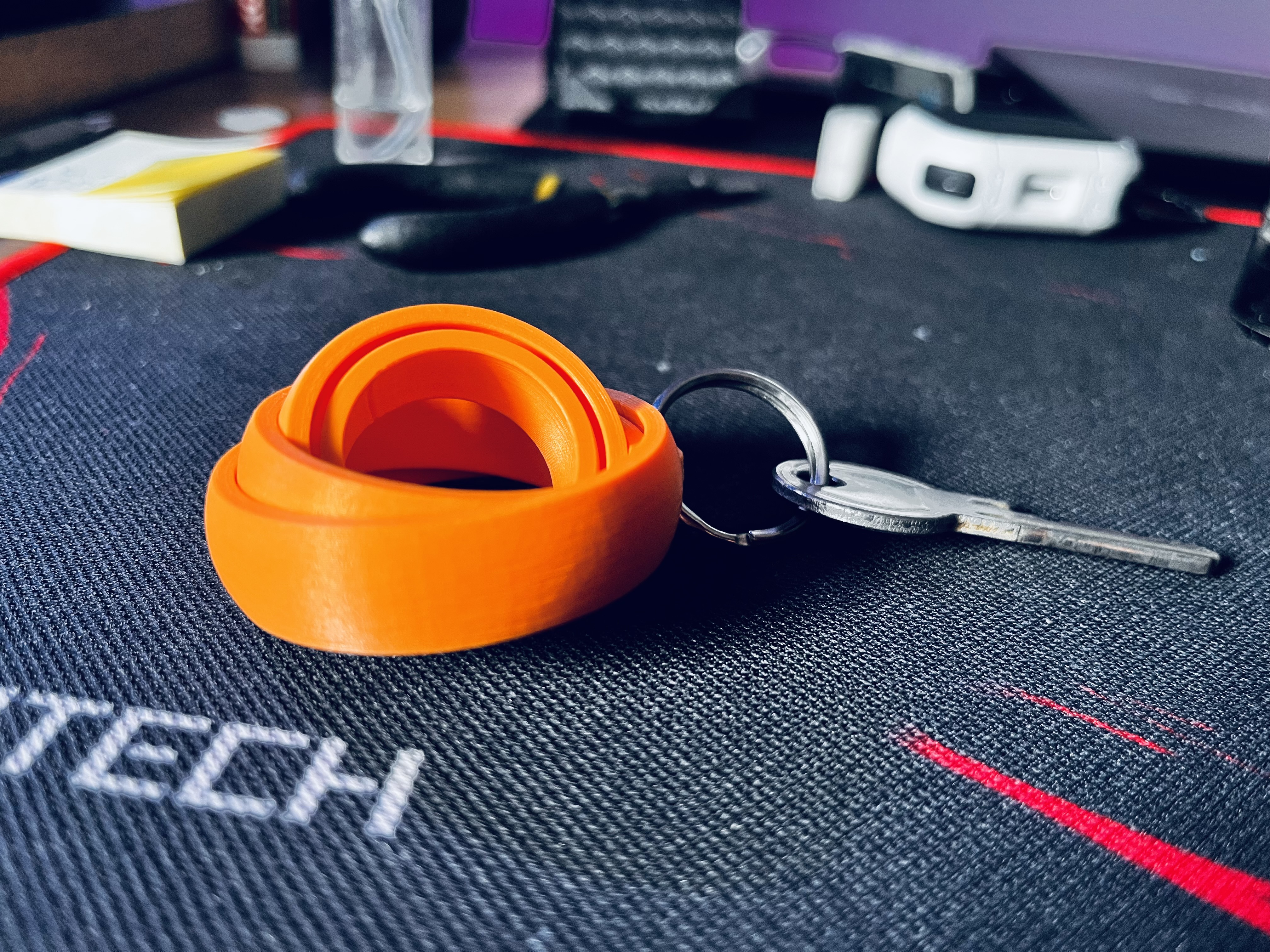 Rotating rings keychain by FusionWave MakerWorld: Download Free 3D Models