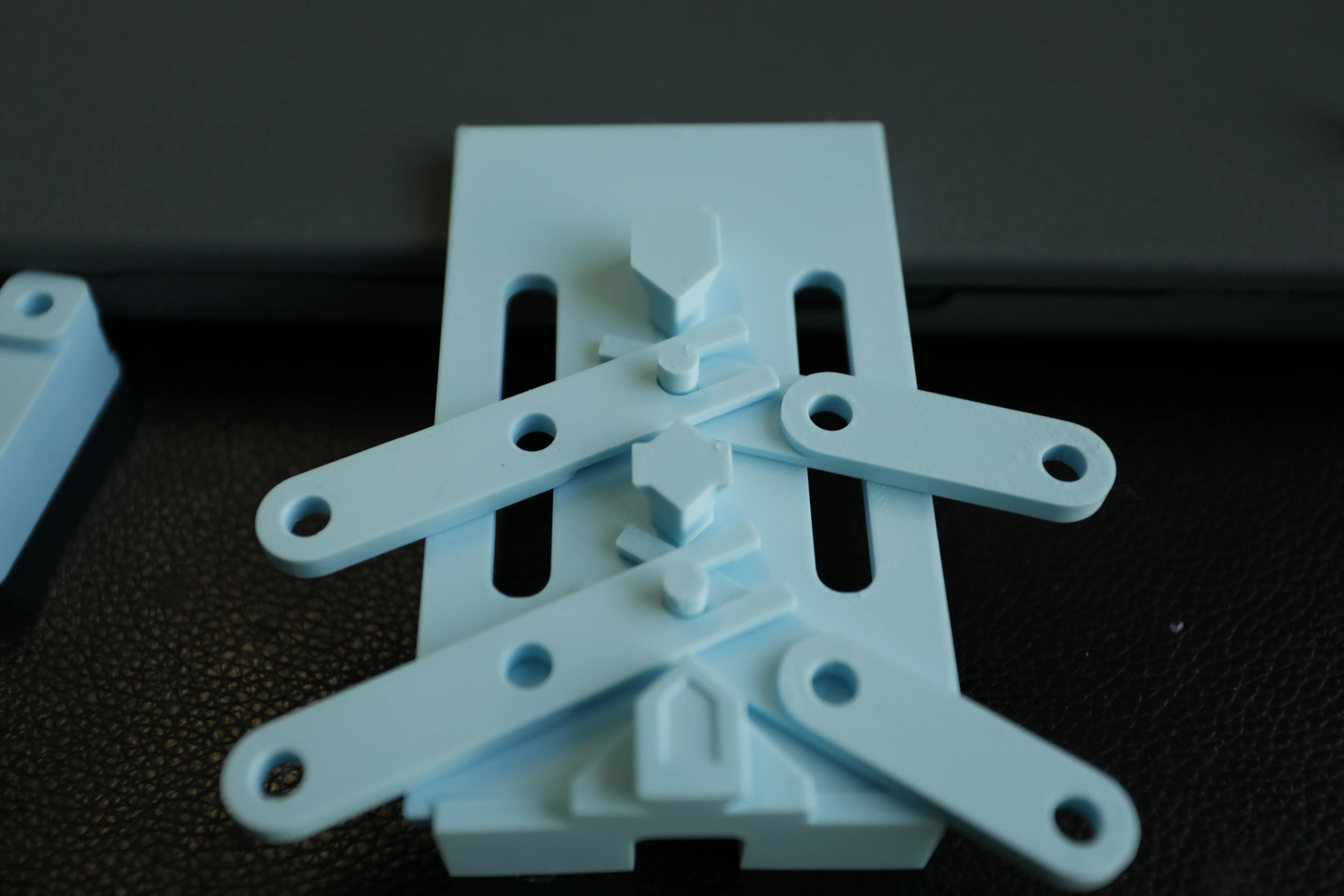 Gravity Self-Clamping Phone Holder - Free 3D Print Model - MakerWorld