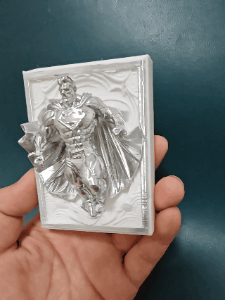 Superman bursting through a wall, Superman's steel body, silver painted ...