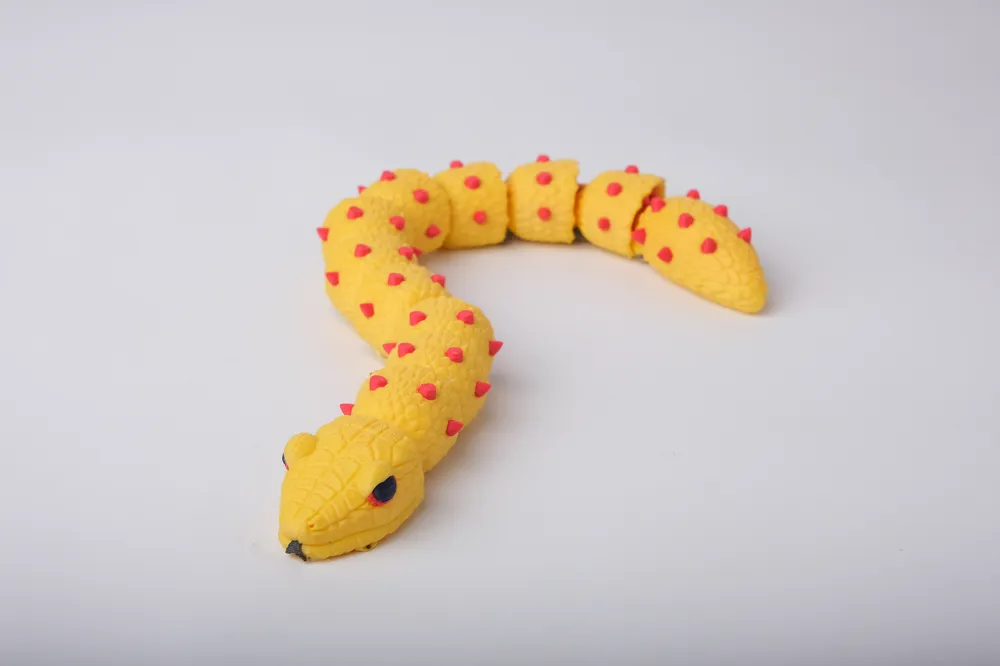 Articulated & Flexible Spiky Yellow Snake Toy - Free 3D Print Model ...