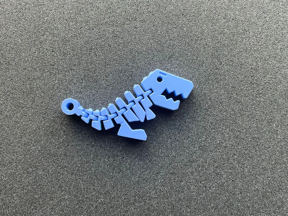 Flexi Rex with stronger links Keychain Remixed by Patrilipeo MakerWorld ...
