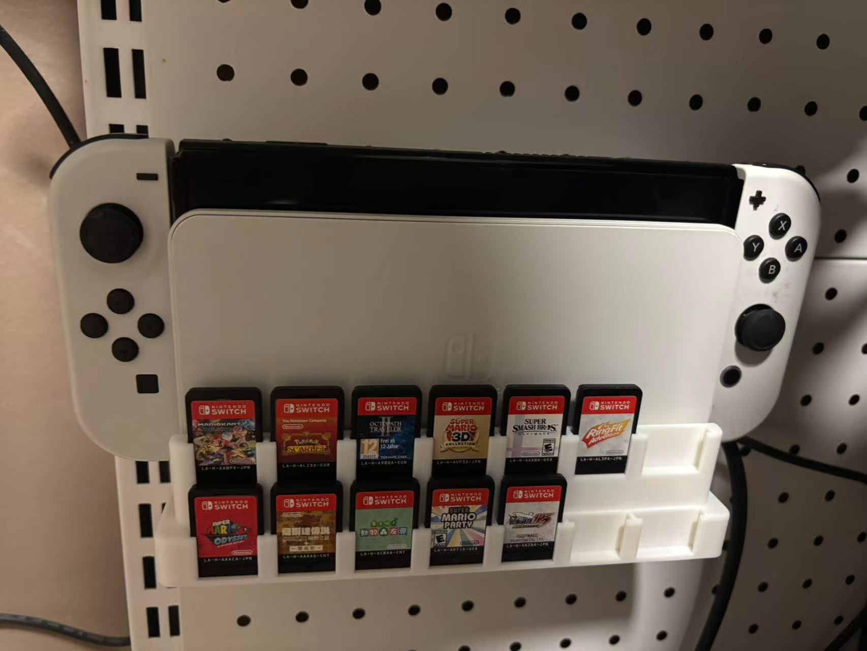 五金少女洞洞板 Nintendo Switch OLED 底座 二次创作 - 来自 baiyanlali MakerWorld：免费下载 3D 模型