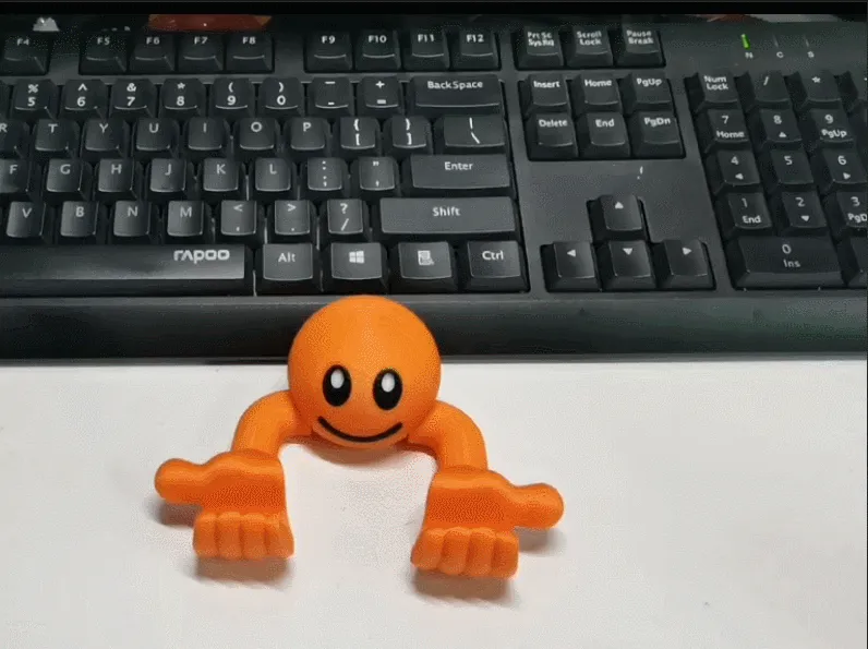 360-degree rotating smiley face thumb phone stand by yongyia3D ...