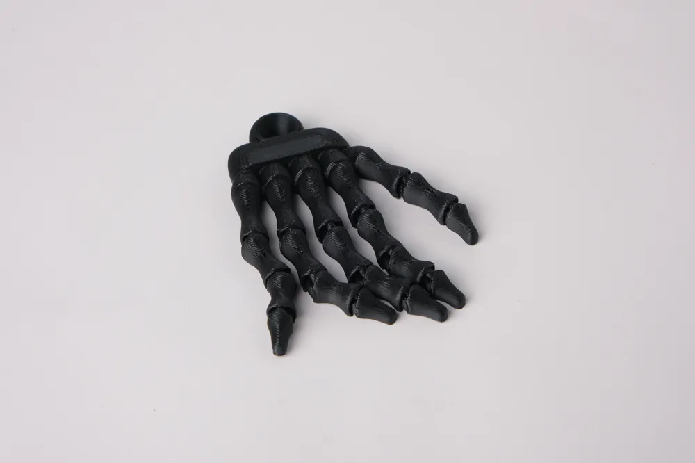 Articulated Toy — The Bony Hand - Free 3D Print Model - MakerWorld
