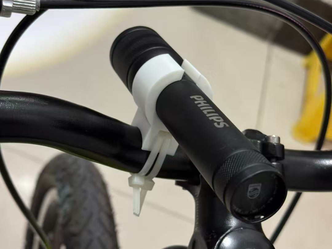 Bicycle flashlight mount by 北洋舰长 MakerWorld: Download Free 3D Models