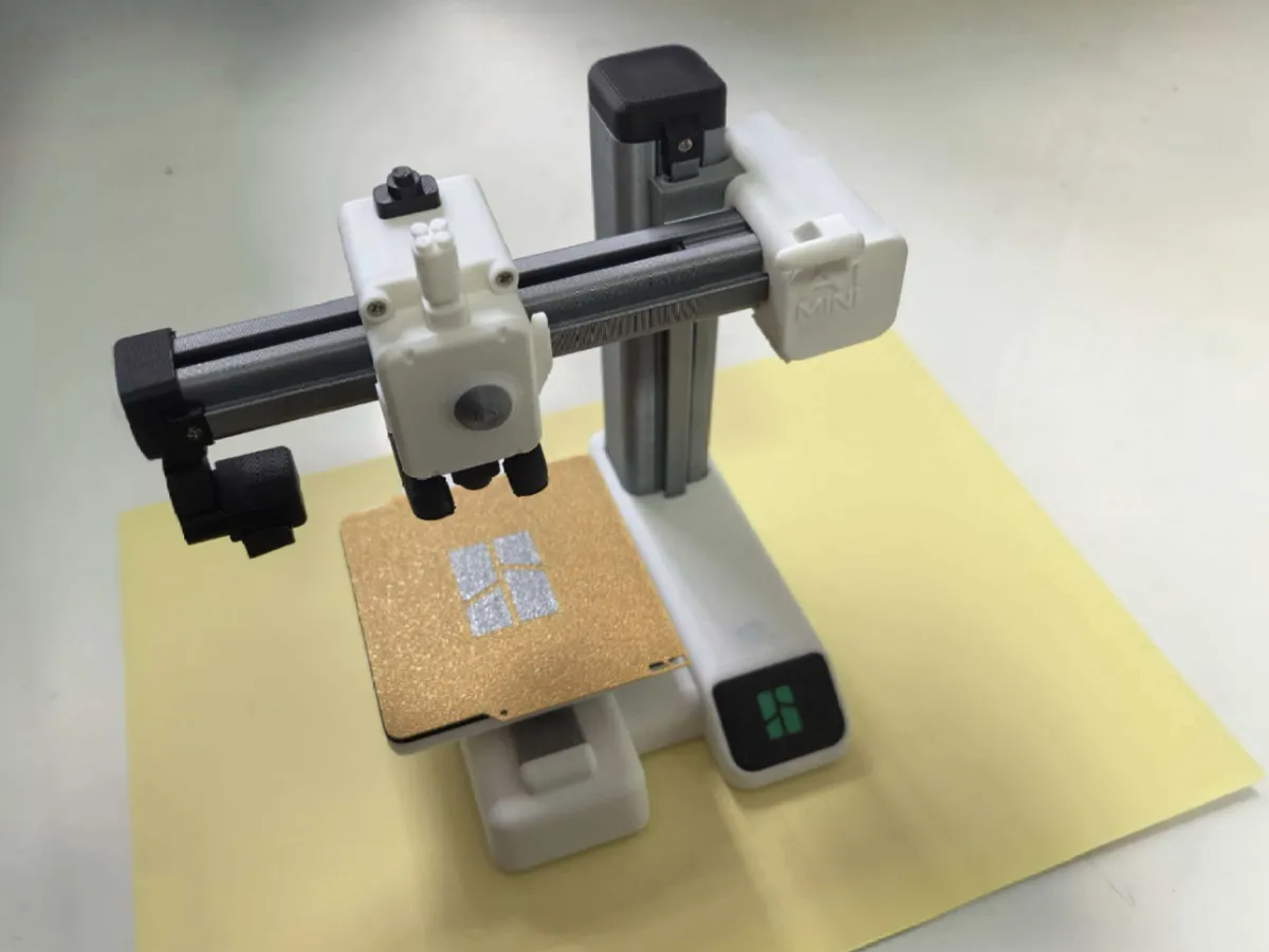 A gold build plate made for the Bambu Lab A1 mini wireless charger by ...