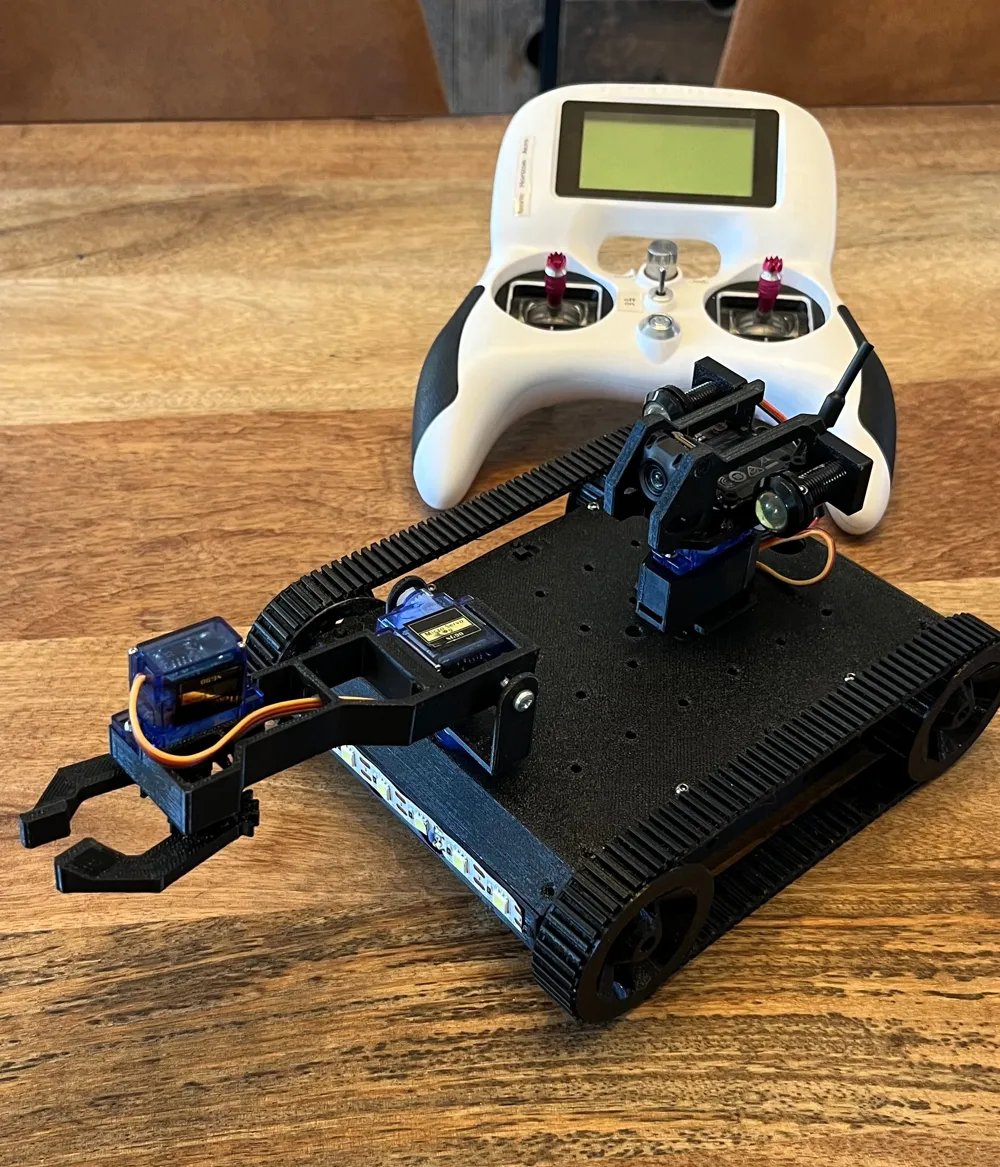 Fpv tracked tank with robot arm - Free 3D Print Model - MakerWorld