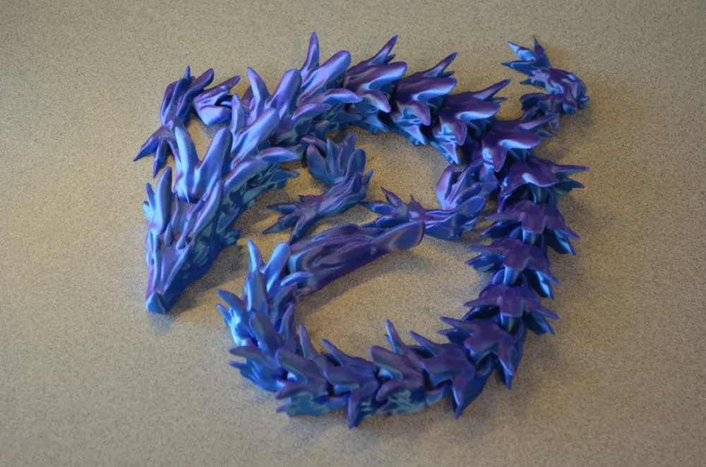 Articulated Full-Motion Dragon Figurine - Free 3D Print Model - MakerWorld