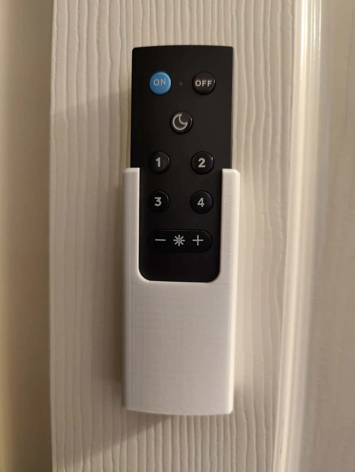 Soporte de pared para control remoto Wiz (WiZmote) por Cody Sechelski MakerWorld: Descarga ...