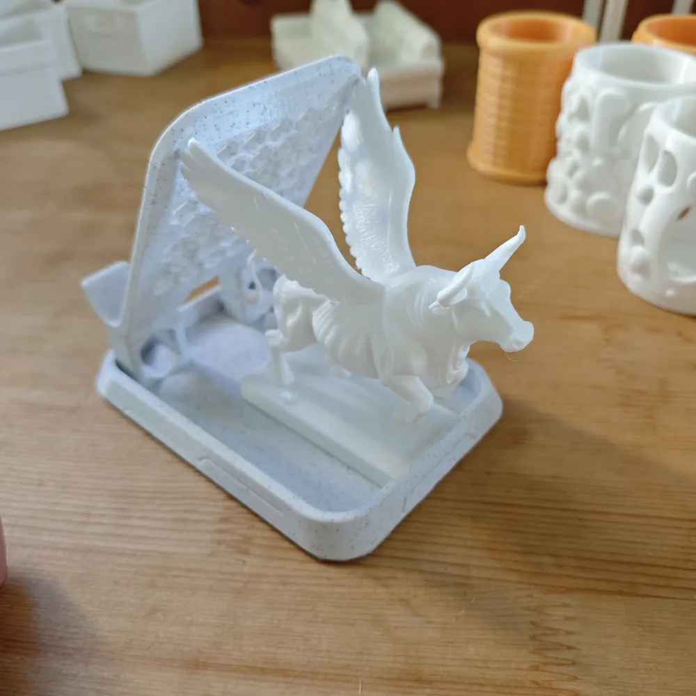 Med vingar Oxe Startar Mobilhållare Utskriven i ett stycke ...