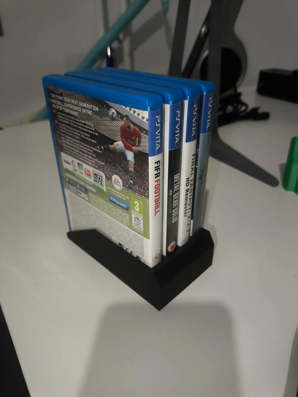 PlayStation Vita Games Stand (4 games) - Free 3D Print Model - MakerWorld