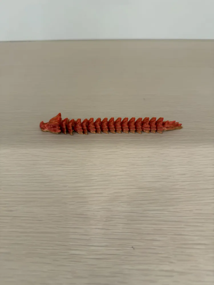 Mini Articulated Dragon - Free 3D Print Model - MakerWorld