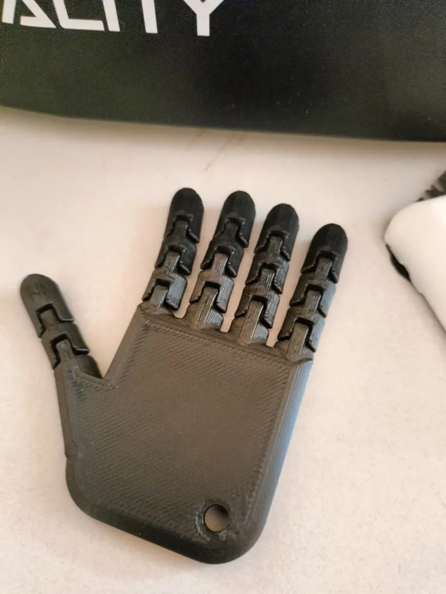 Articulated hand keychain (print in place) - Free 3D Print Model ...