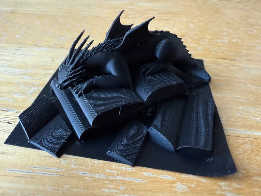 Dragon laying on books - Free 3D Print Model - MakerWorld