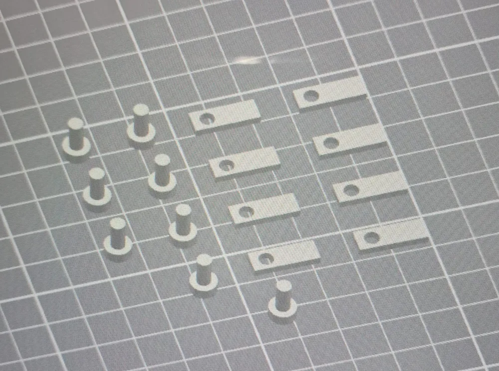 Laser keychain engraving holder - Free 3D Print Model - MakerWorld