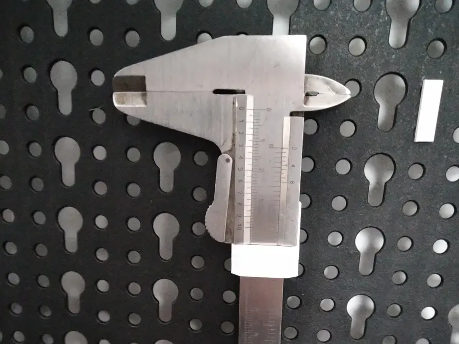 Caliper holder for Parkside pegboard - Free 3D Print Model - MakerWorld
