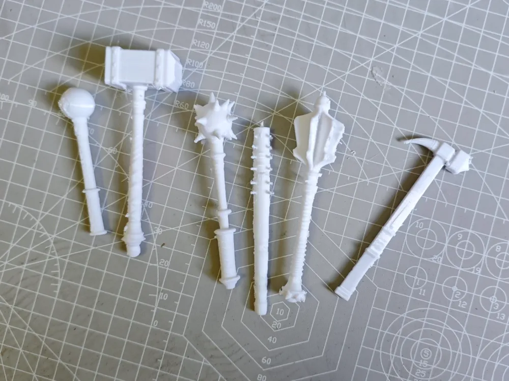 Over a dozen types of brick weapon and armament packs, minifigure ...