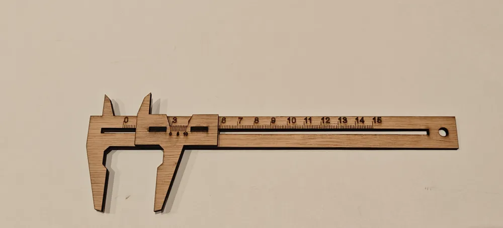 Laser-Cut Wooden Metric Calipers - Free 3D Print Model - MakerWorld
