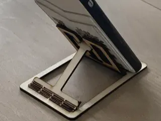 Laser cut living hinge phone stand - Free 3D Print Model - MakerWorld