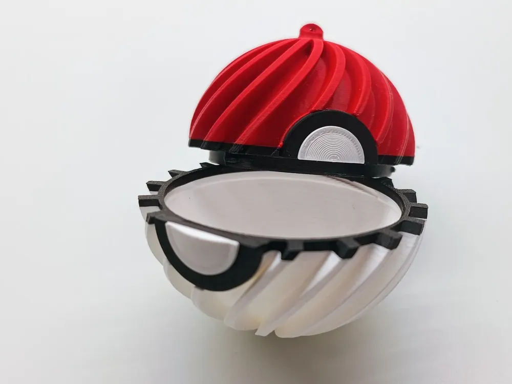 Christmas surprise ball in Pokeball style by Made With Lay3rs - MakerWorld